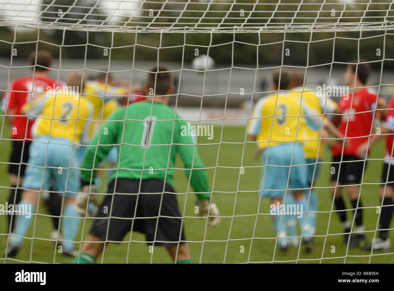 Football Match from behind the goal Stock Photo - Alamy