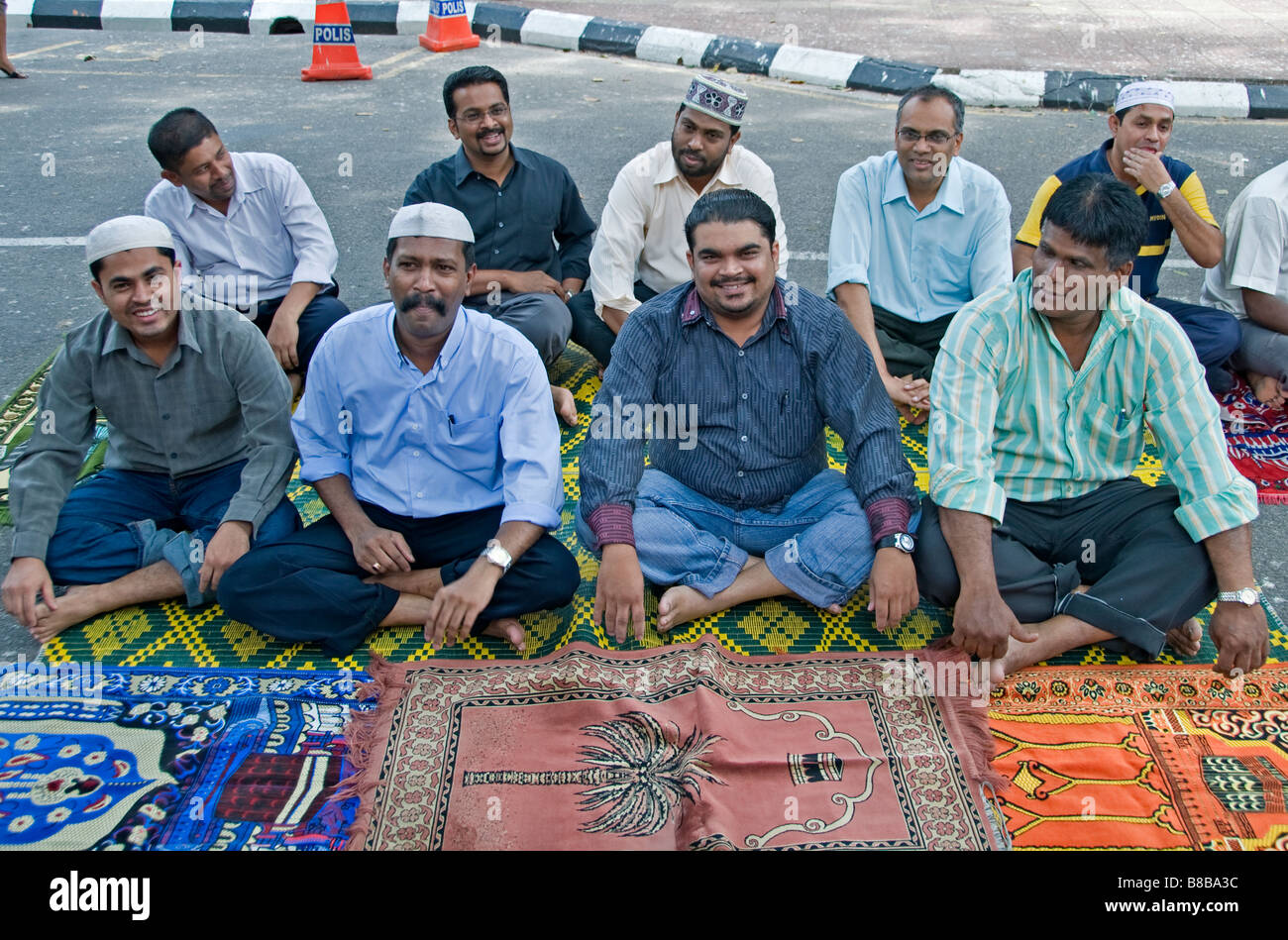 Malaysia Friday Prayer men praying in the street Jalan Masjid India and ...