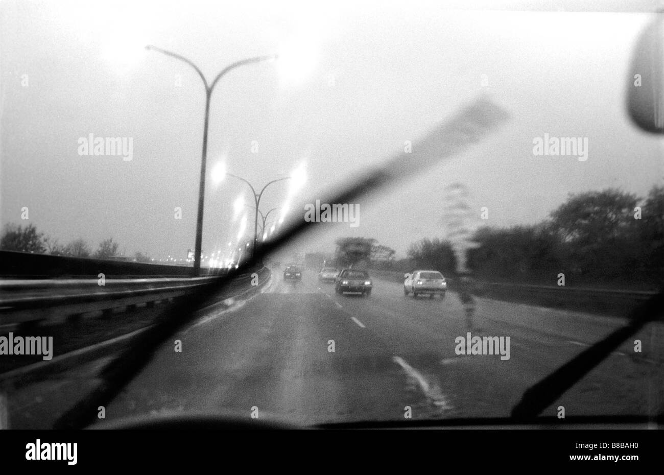 View Road through Car Windshield, B/W Stock Photo - Alamy