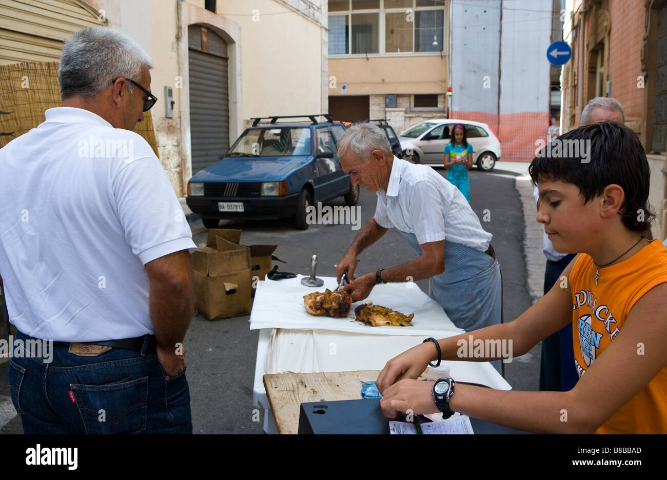Selling cooked chicken on the street Castellana Grotte Puglia Italy ...