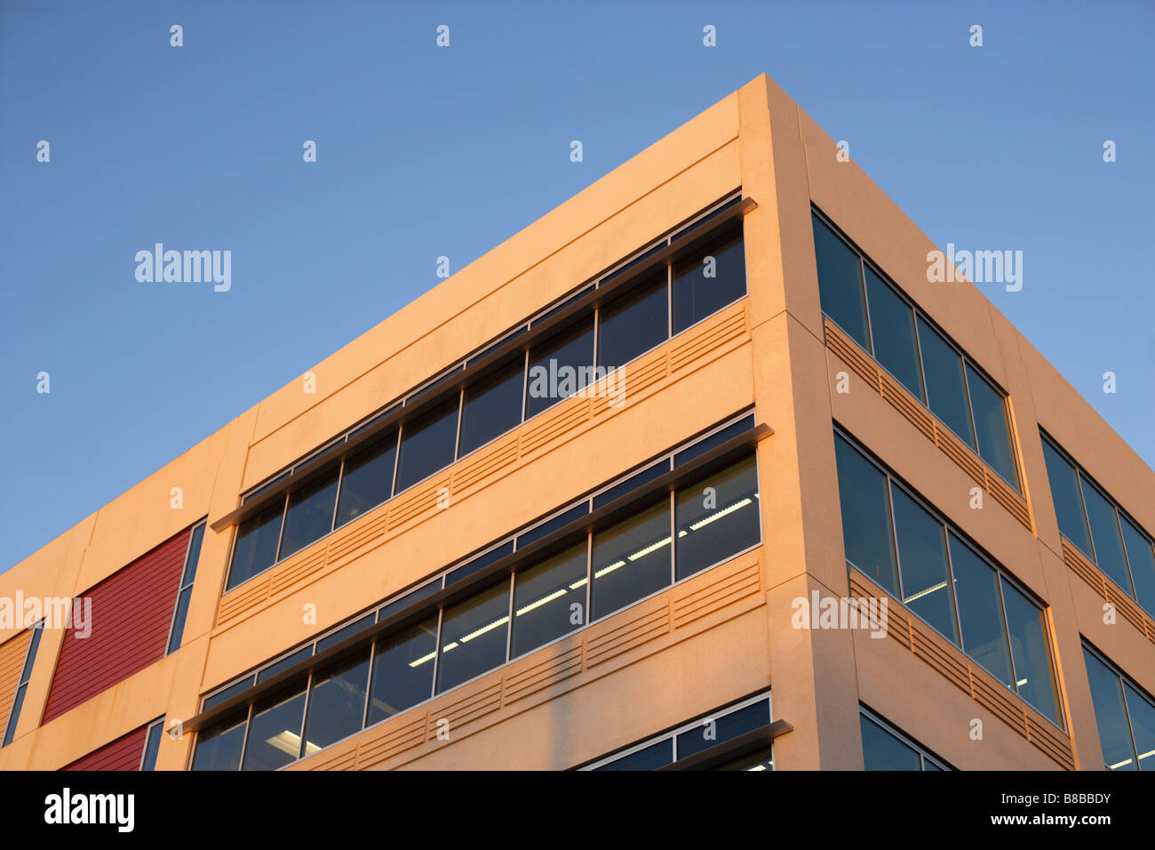 An office building with a empty parking lot Stock Photo - Alamy