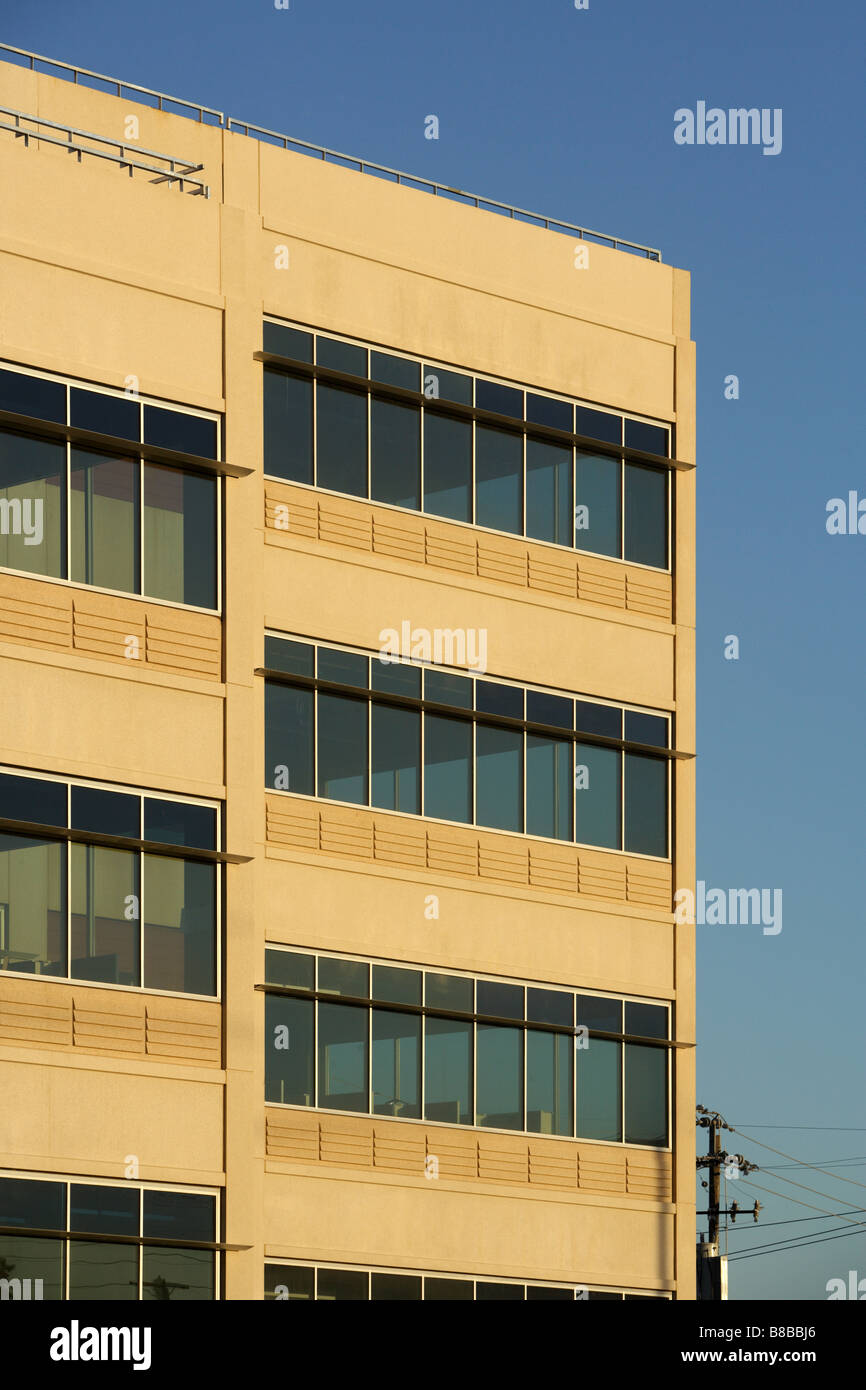 An office building with a empty parking lot Stock Photo - Alamy