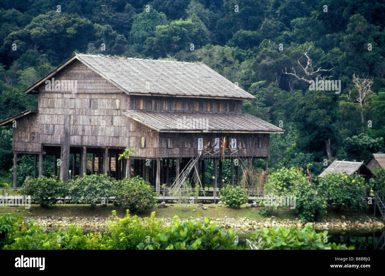 Tribal longhouse typical of Borneo within the Sarwak Cultural Village ...