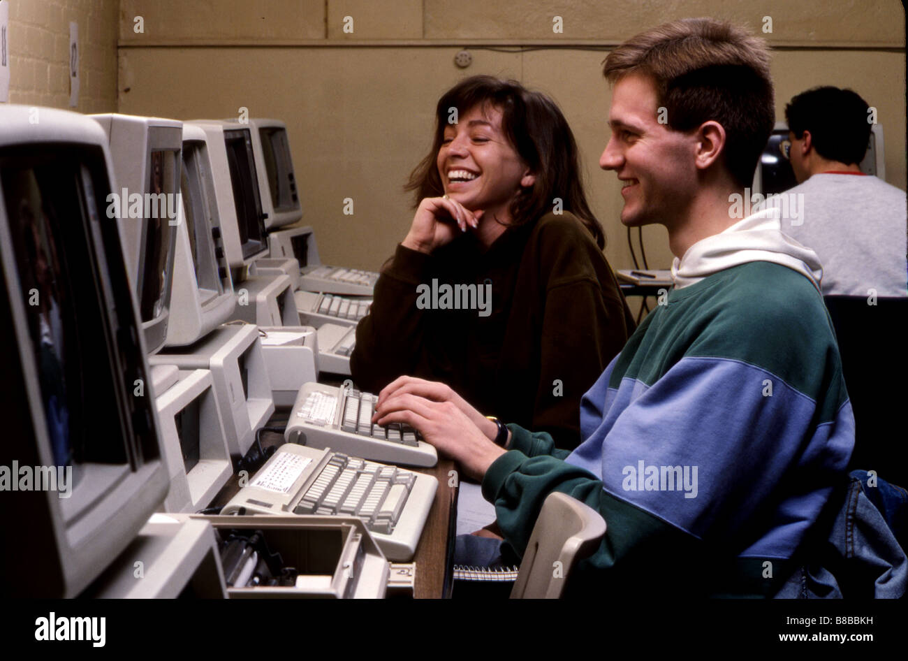 Male and female college students in computer lab Stock Photo - Alamy