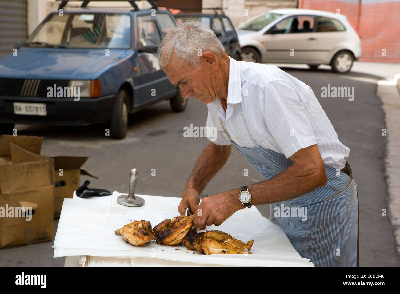 Selling cooked chicken on the street Castellana Grotte Puglia Italy ...