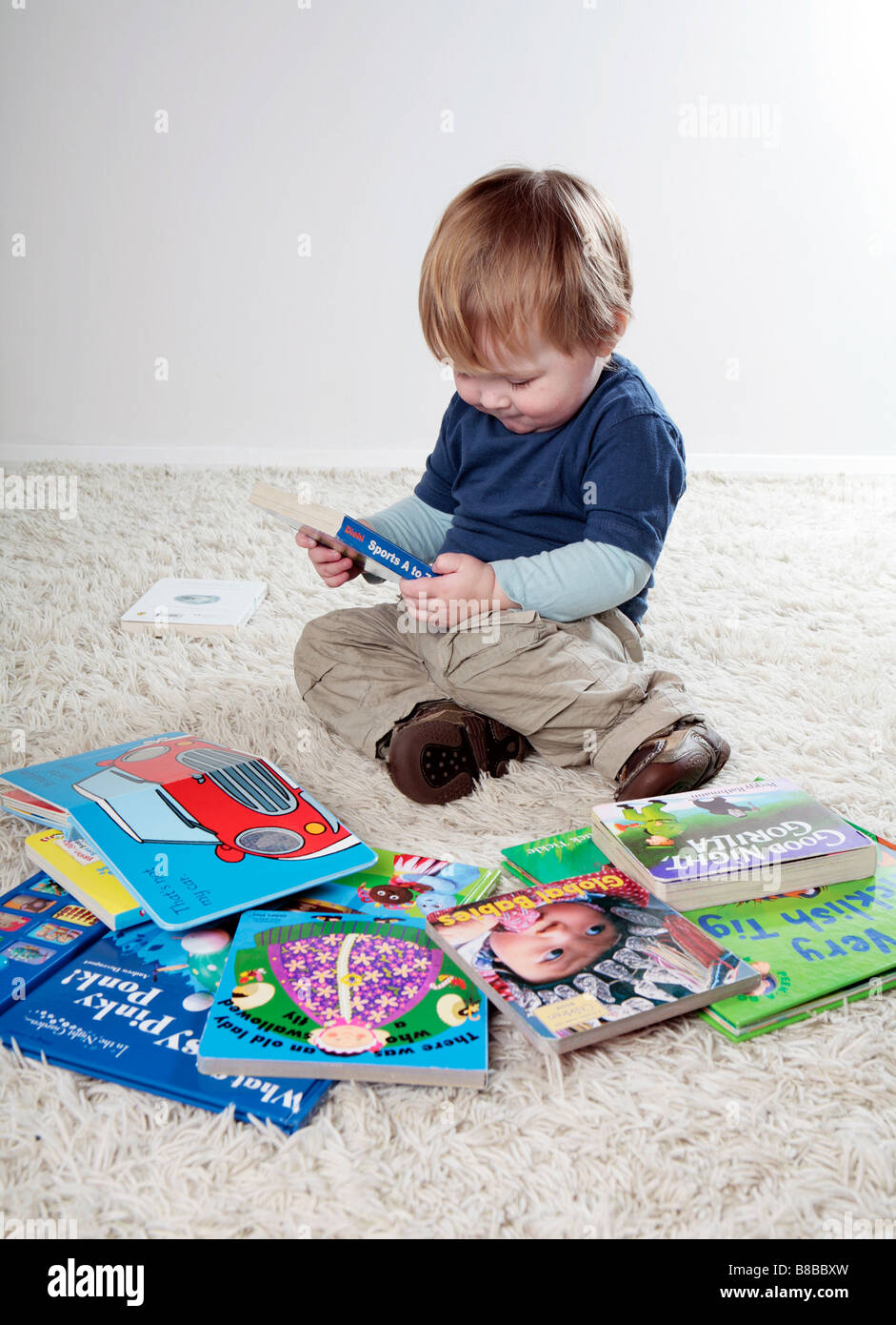 Baby boy reading (with signed model release - available for commercial ...