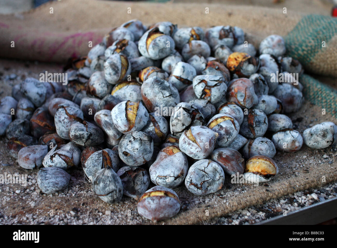 Roasted chestnuts from a traditional street seller Stock Photo - Alamy