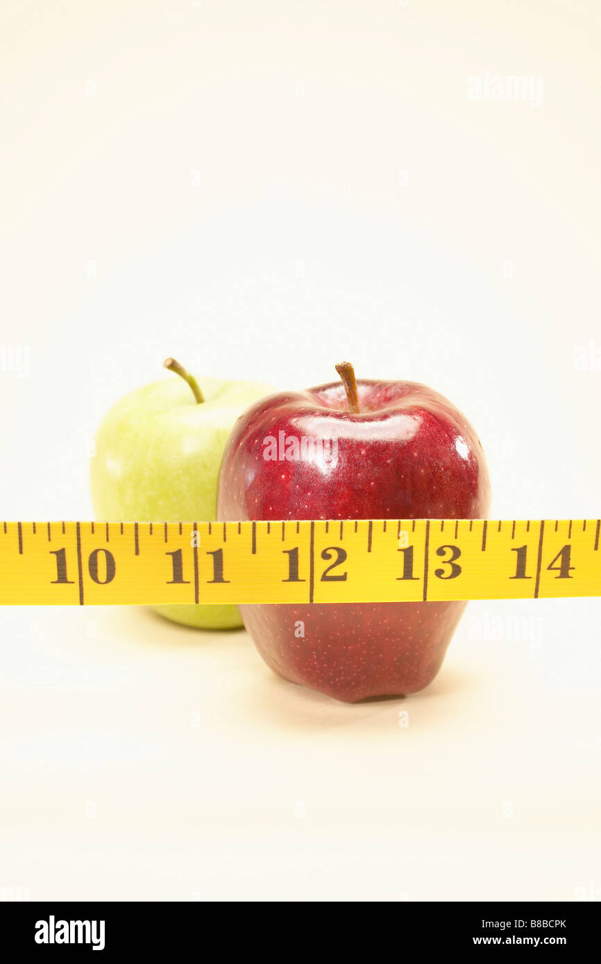 Apples Measuring Tape Stock Photo - Alamy