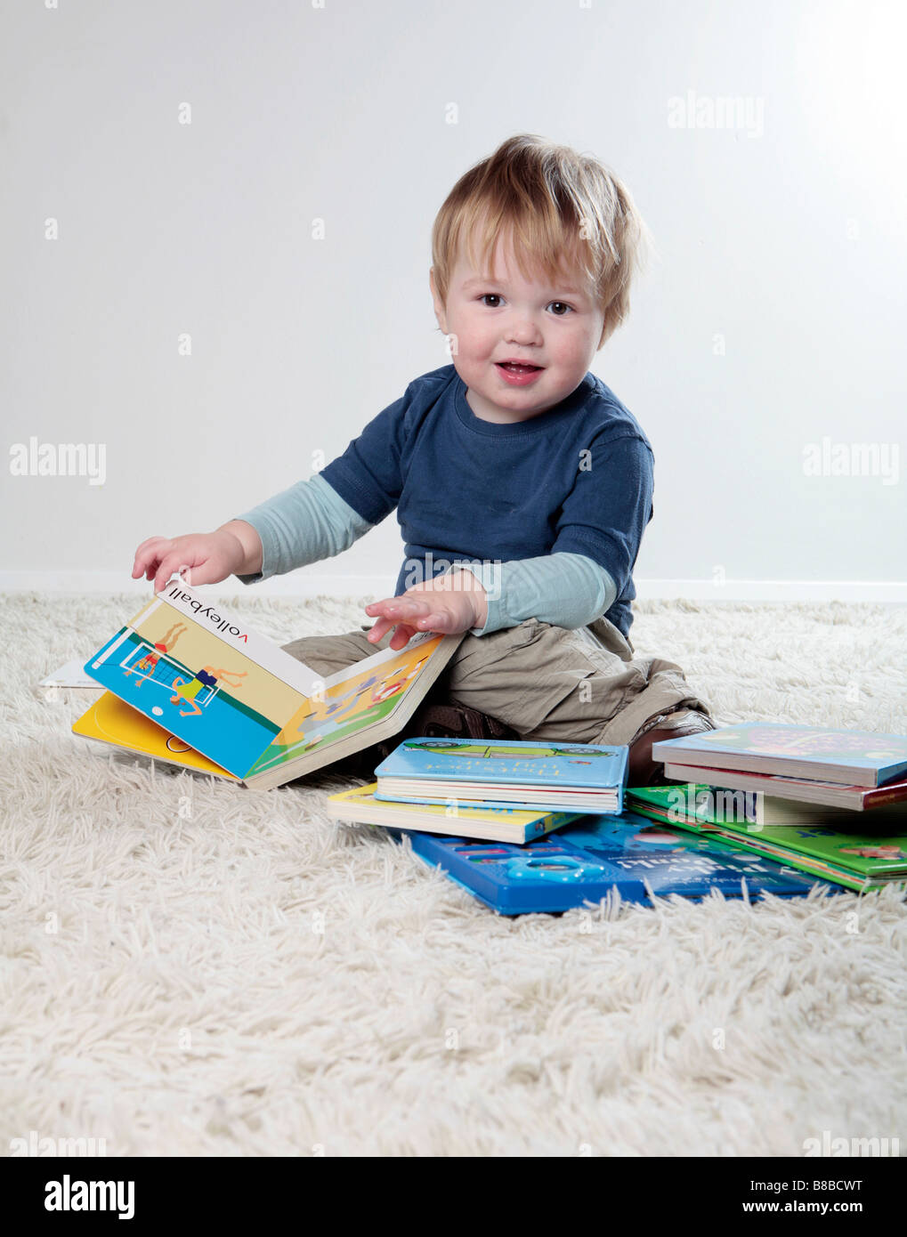 Baby boy reading (with signed model release - available for commercial ...