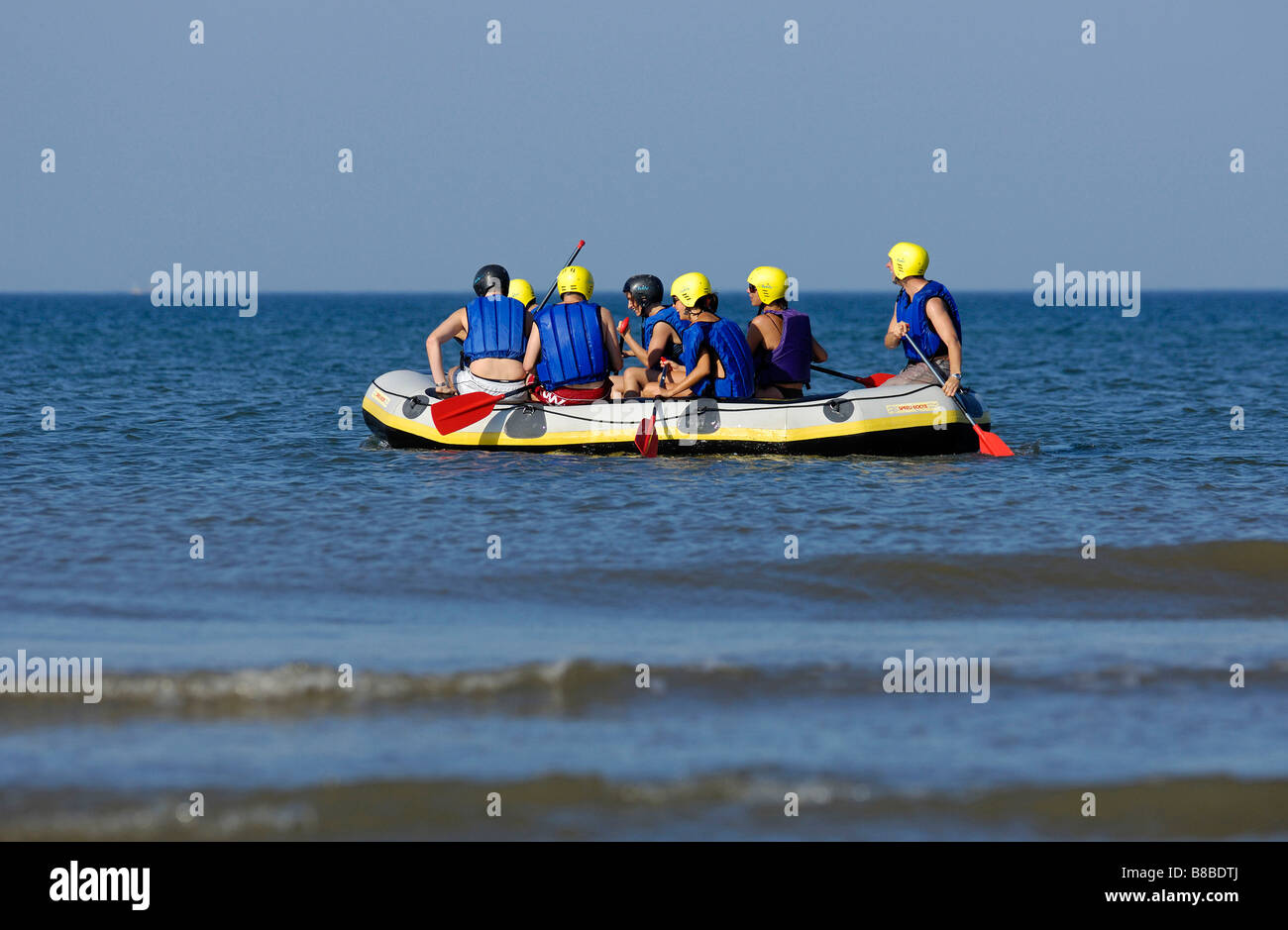 Men in rubber dinghy hi-res stock photography and images - Alamy
