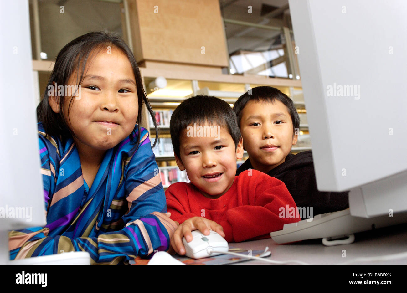 Kids Working Computers, Library, Cambridge Bay, Nunavut Stock Photo - Alamy
