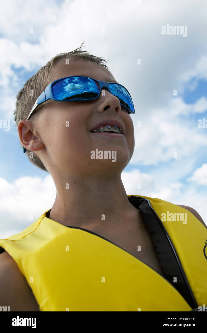 Boy Life Jacket wearing Sun Glasses Stock Photo - Alamy