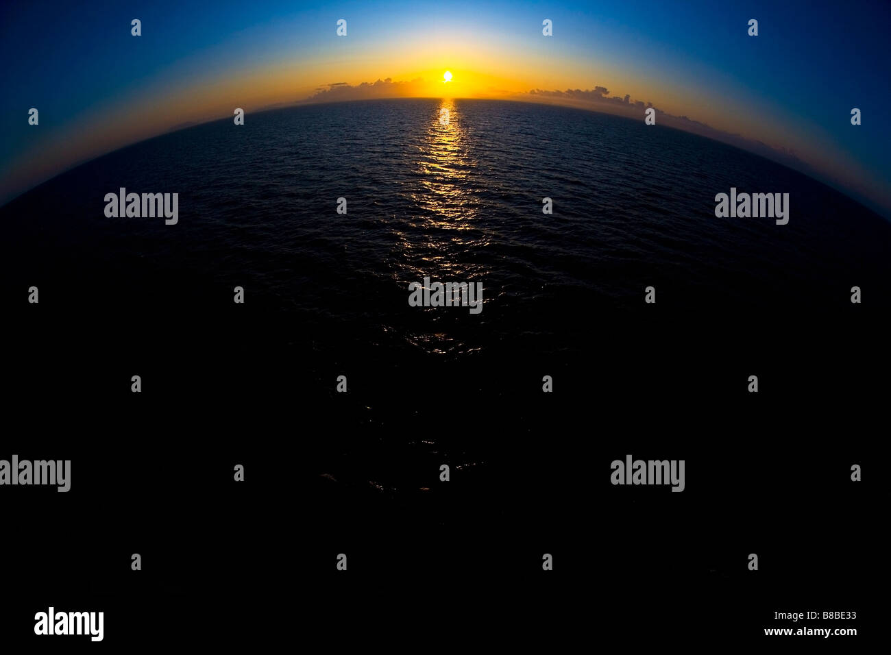 Sun on the horizon Stock Photo - Alamy