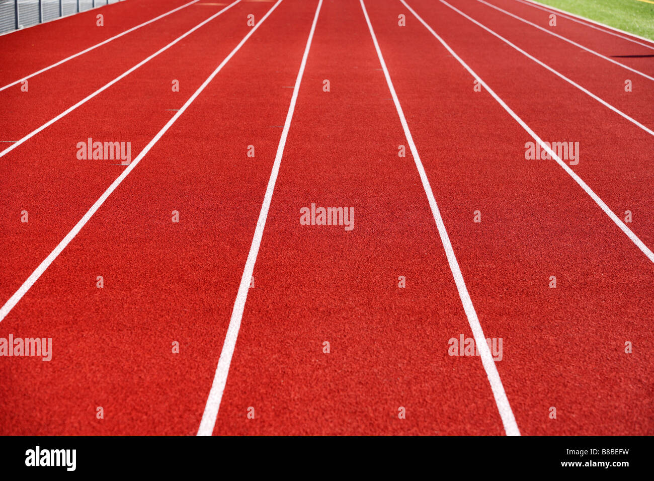 A blue track at a High School Stock Photo - Alamy