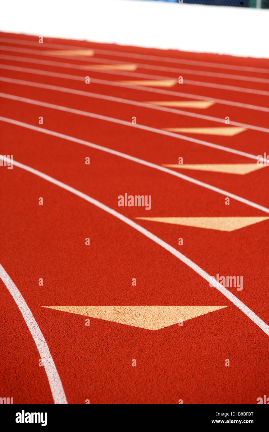 A blue track at a High School Stock Photo - Alamy