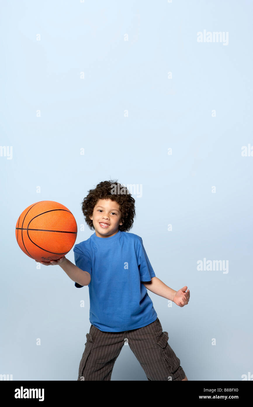 Boy Playing Basketball Stock Photo - Alamy