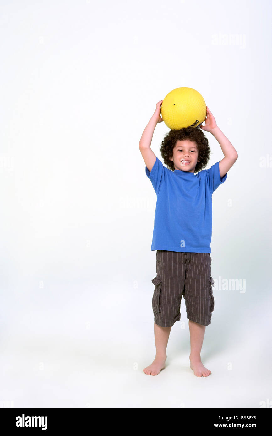 Boy Playing Ball Stock Photo - Alamy