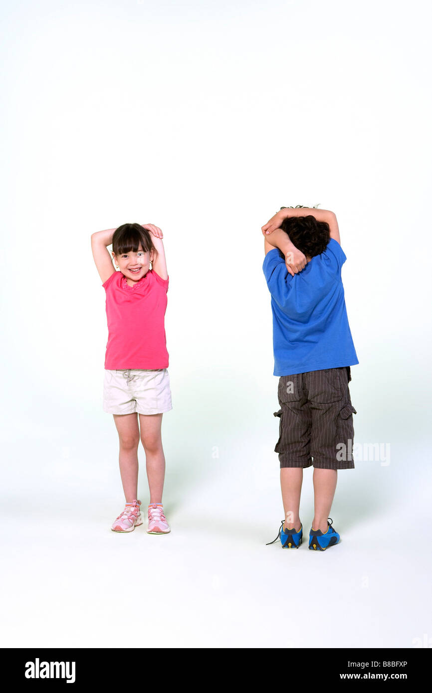 Kids Stretching Arms Stock Photo - Alamy