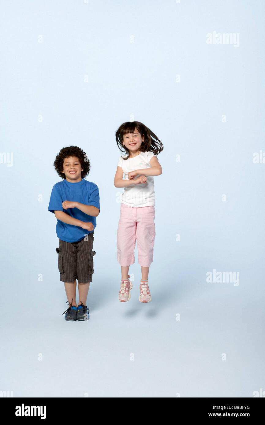 Kids Jumping Playing Stock Photo - Alamy
