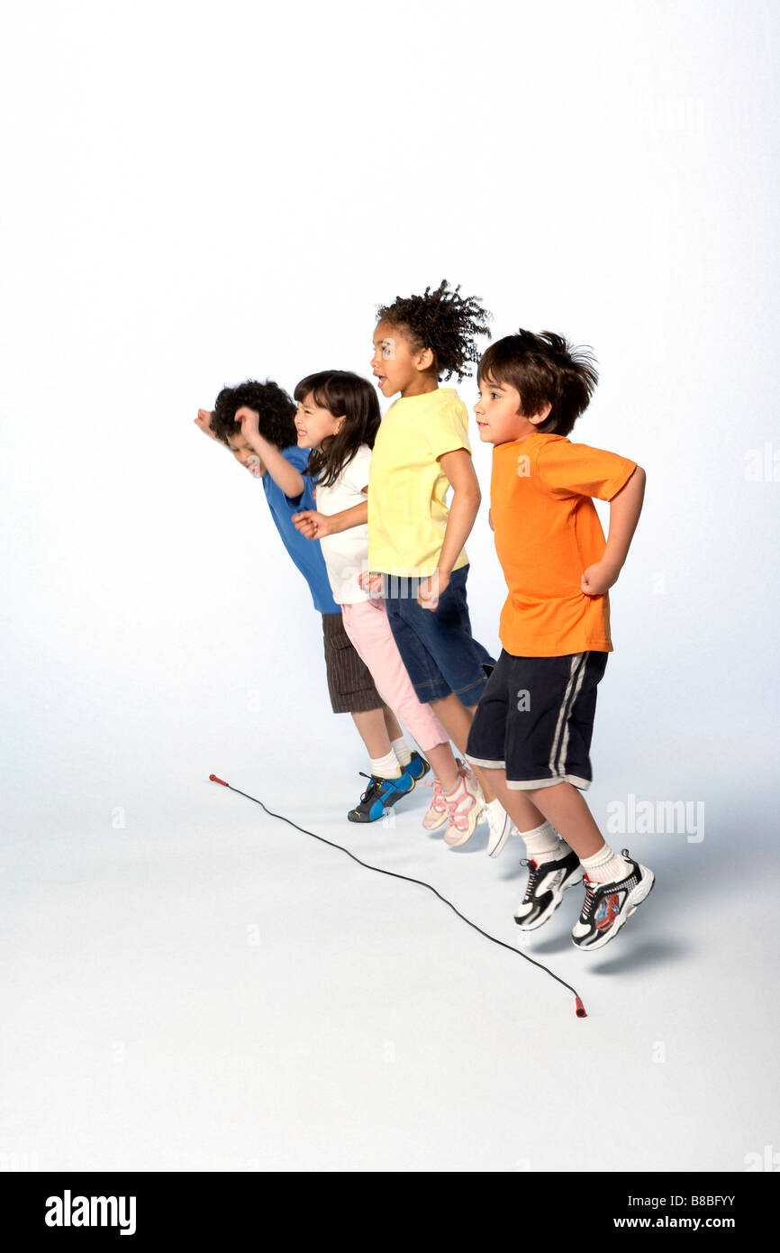 Kids Jumping over Rope Stock Photo - Alamy