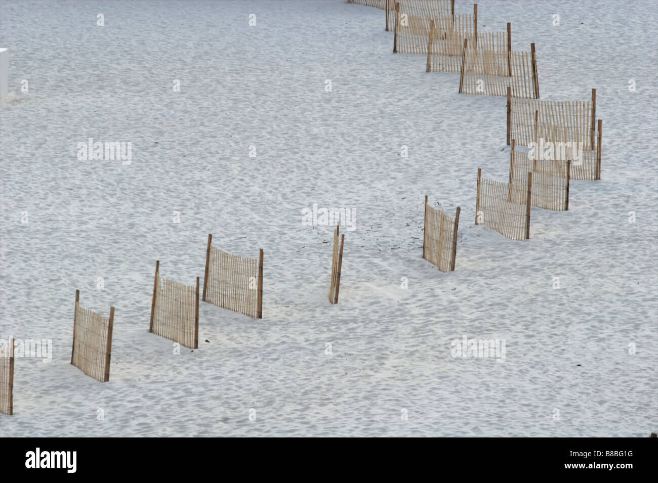 row of beach fences Stock Photo - Alamy