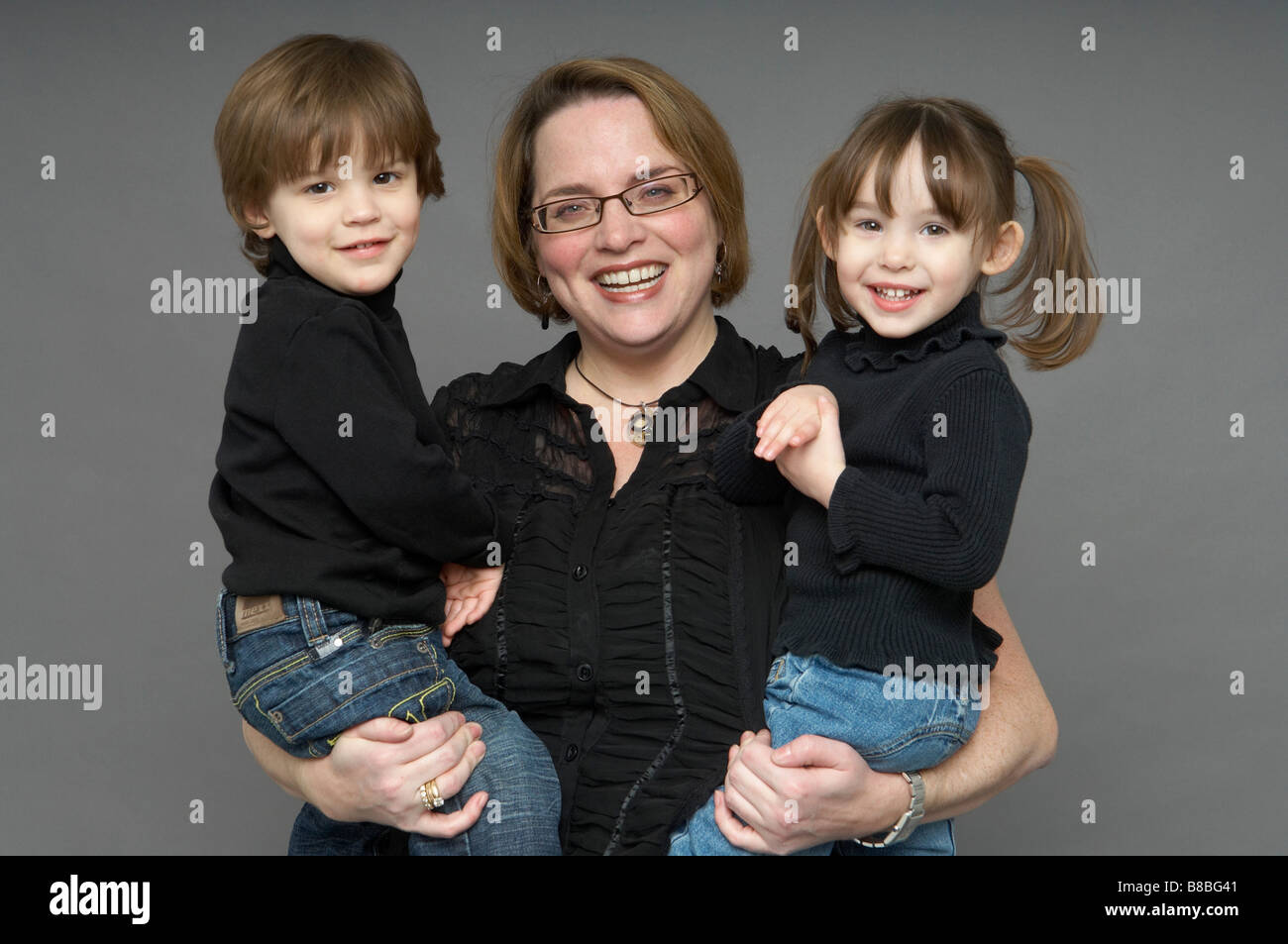 Portrait Mom Twins Stock Photo - Alamy