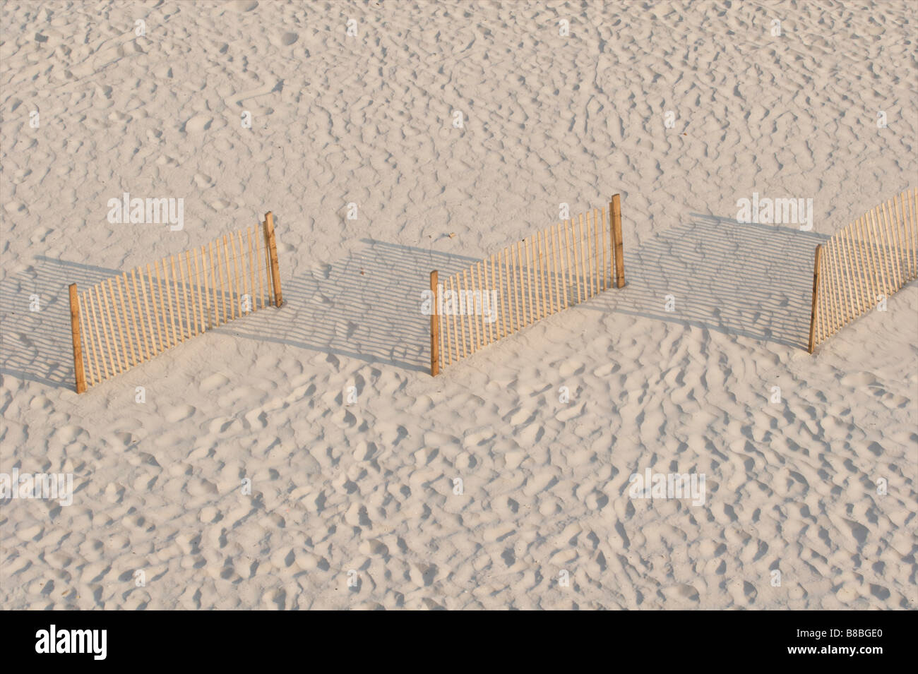 row of beach fences Stock Photo - Alamy