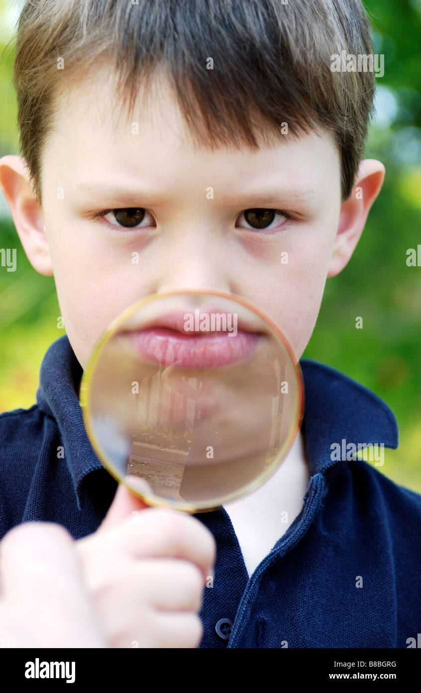 FV5506, Brian Summers; Boy Frowning Magnify Glass over Mouth Stock ...