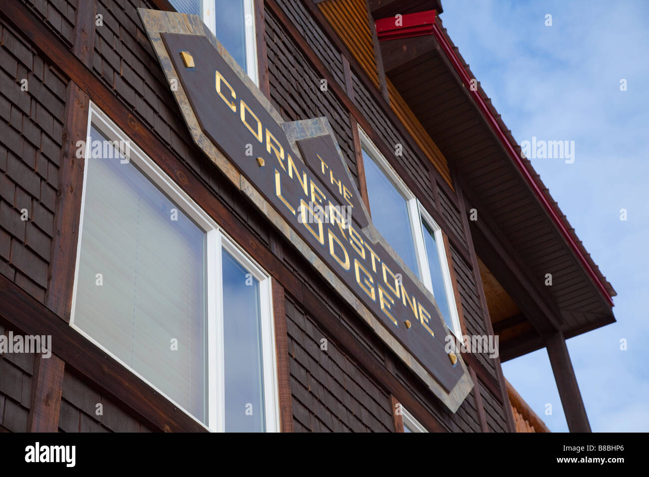 Building sign for The Cornerstone Lodge on mountain accommodation at ...