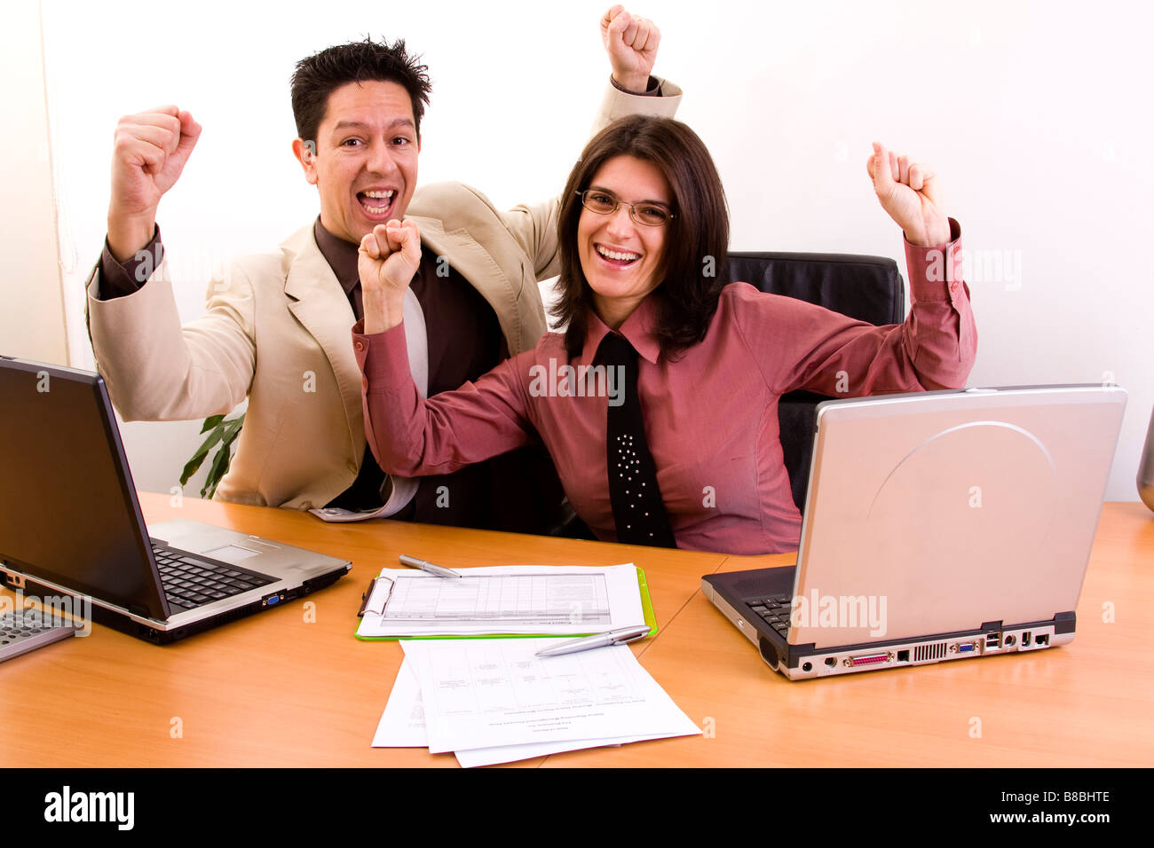 confident and successful business team at the office Stock Photo - Alamy