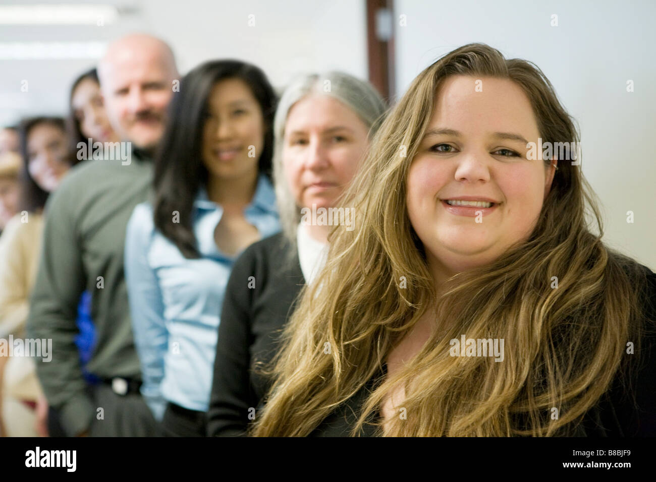 Portrait if Businesswoman Co-Workers behind her an fice Stock Photo - Alamy