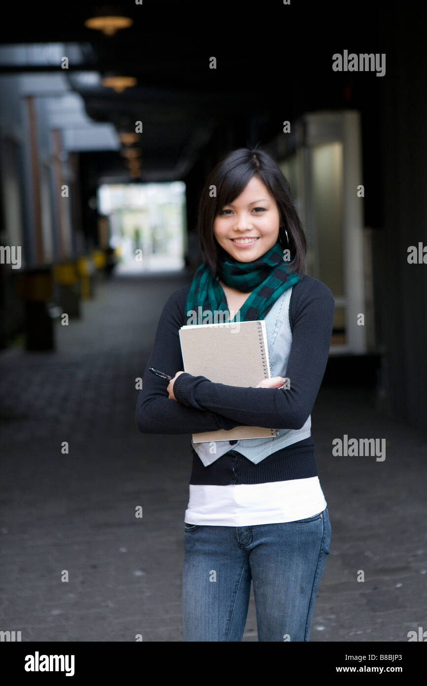 Portrait Teenage Girl Holding Notebook Stock Photo - Alamy