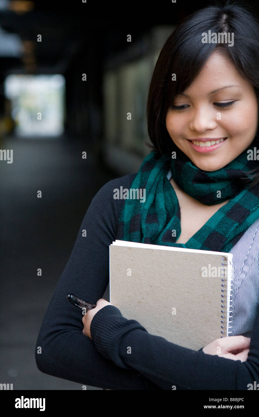 Portrait Teenage Girl Holding Notebook Stock Photo - Alamy