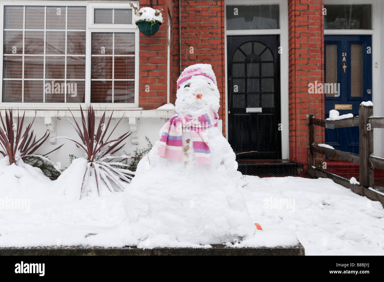 Snowman outside a residential house, London, England UK Stock Photo - Alamy