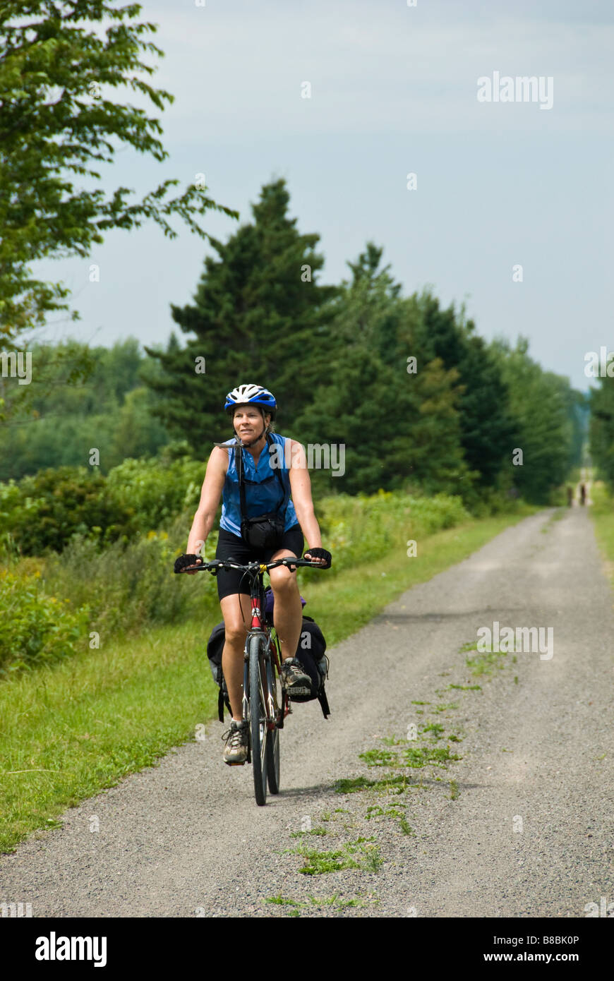 Woman bikes the longest straight stretch of the Confederation Trail ...