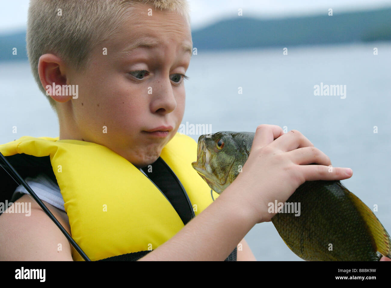 Boy Looking Fish Stock Photo - Alamy