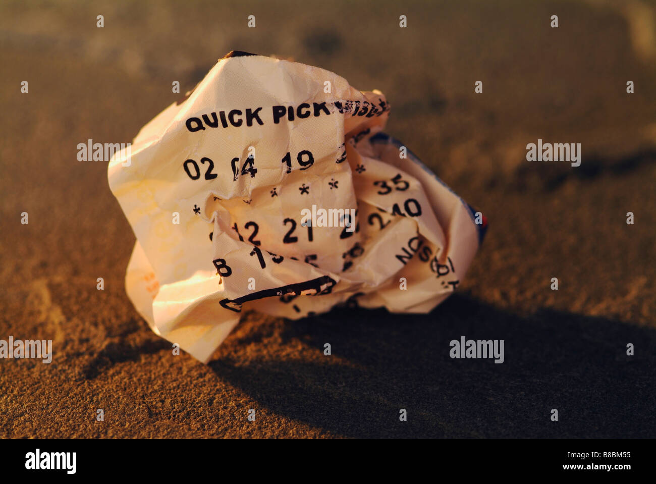 Crumpled up Lottery Ticket, Ground Stock Photo - Alamy