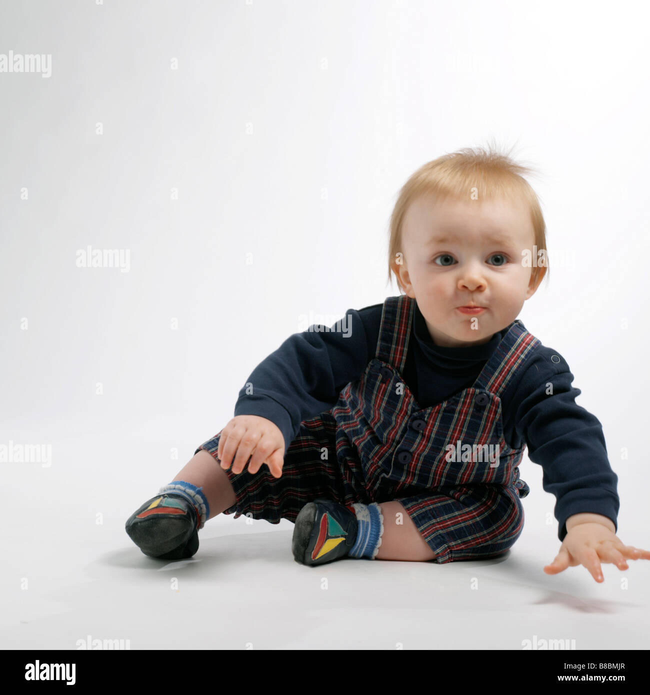 Portrait Boy Sitting Stock Photo - Alamy