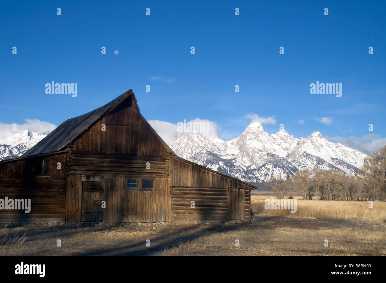 The Grand Tetons Mountain Range with Homestead Ranch and Barn Stock ...