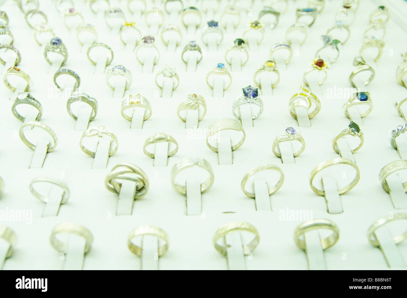 many jewellery rings in an outlet Stock Photo - Alamy