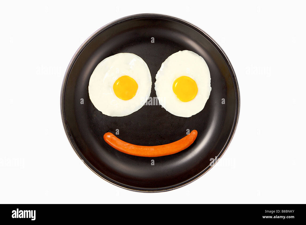 Egg and hot dog in shape of smiley face Stock Photo - Alamy