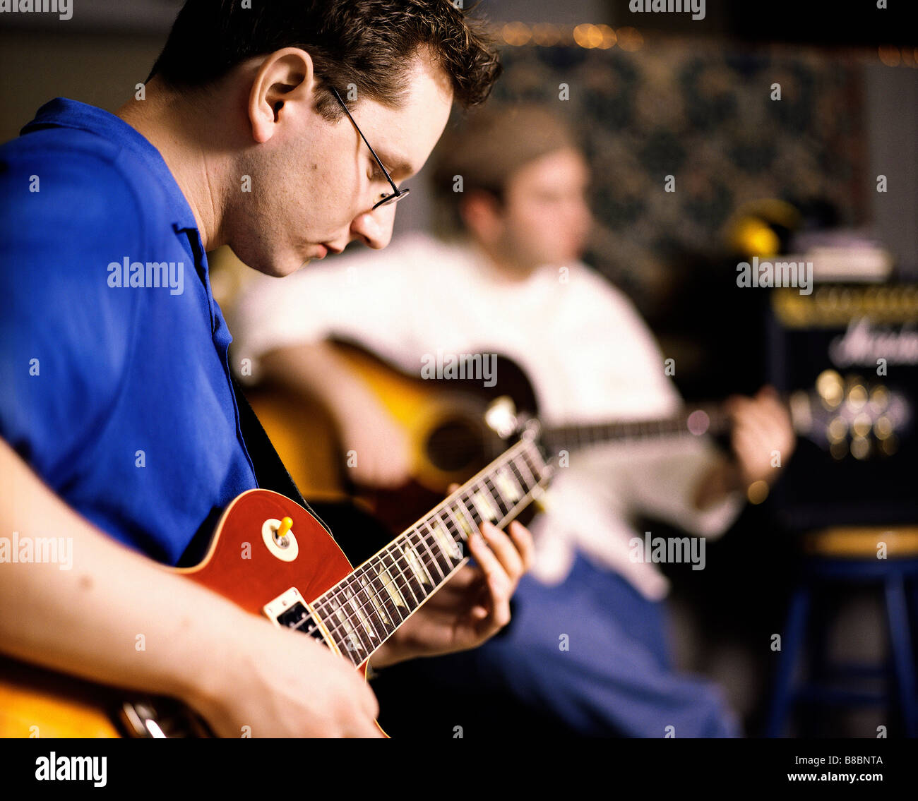 Guys Playing Guitar Stock Photo - Alamy