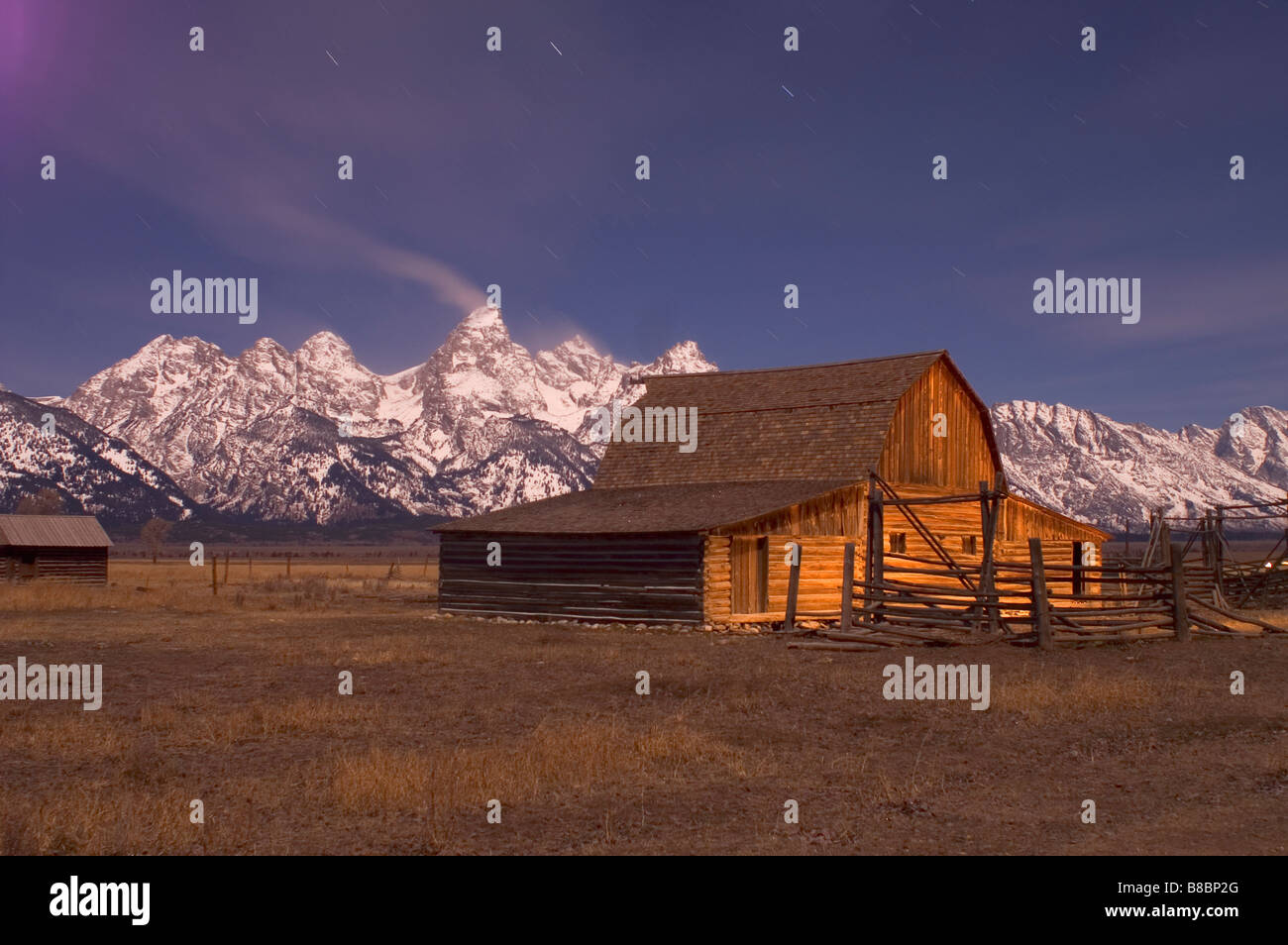 The Grand Tetons Mountain Range with Homestead Ranch and Barn Stock ...