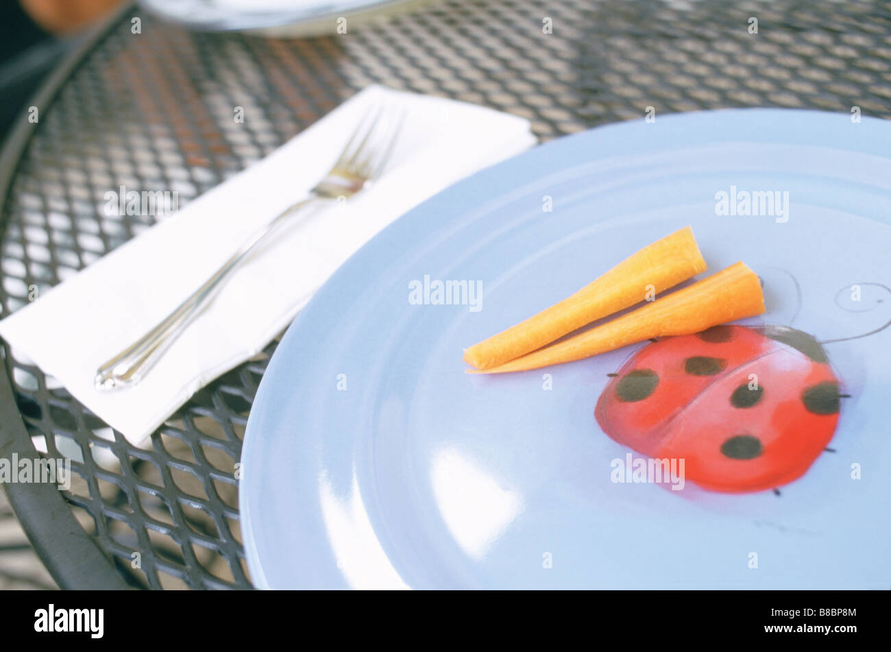 Carrots Ladybug Plate Stock Photo - Alamy