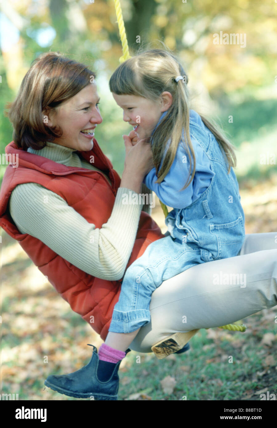 Mother Daughter Swing Stock Photo - Alamy