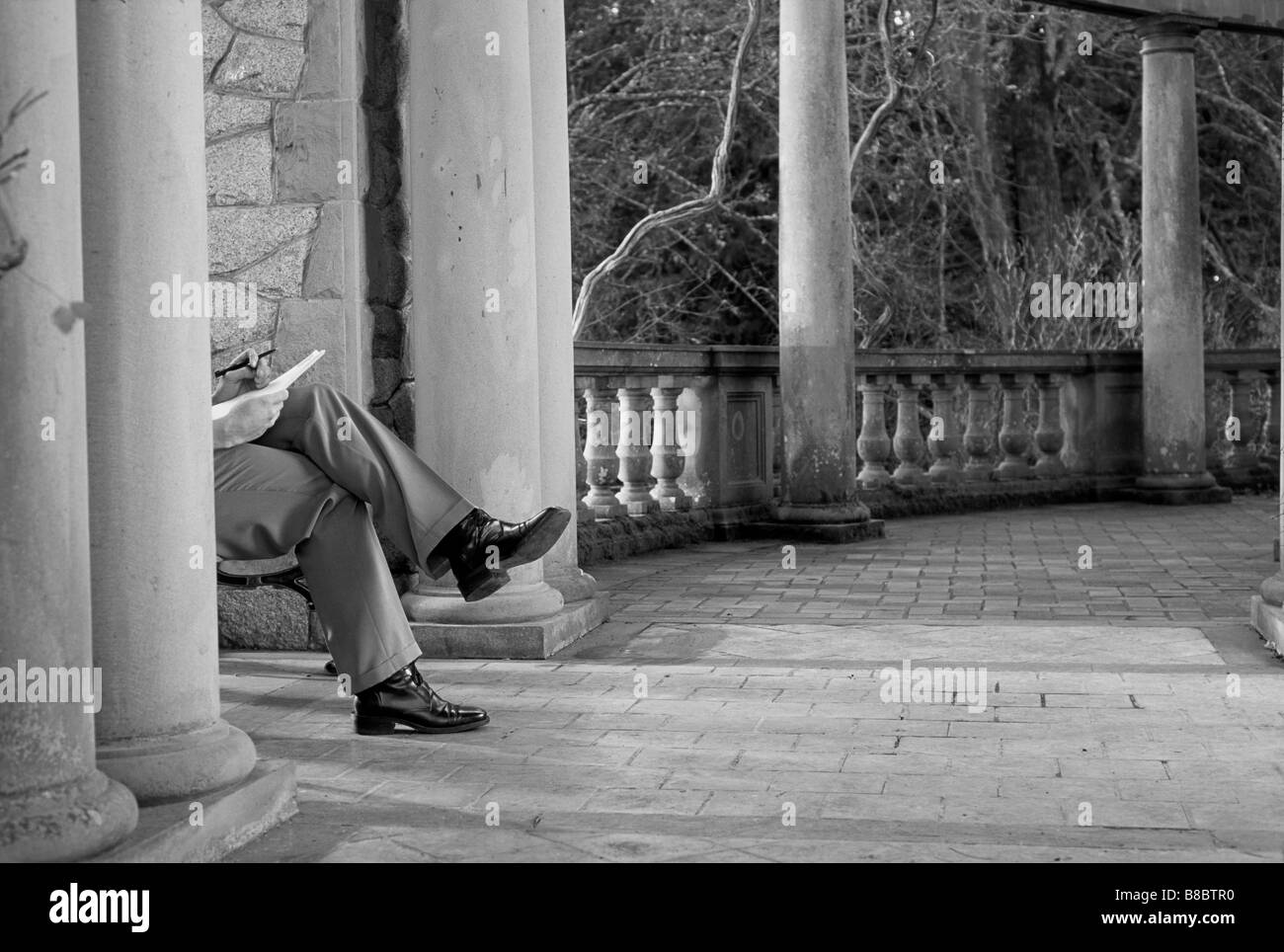 Man's Leg between Columns, B/W Stock Photo - Alamy