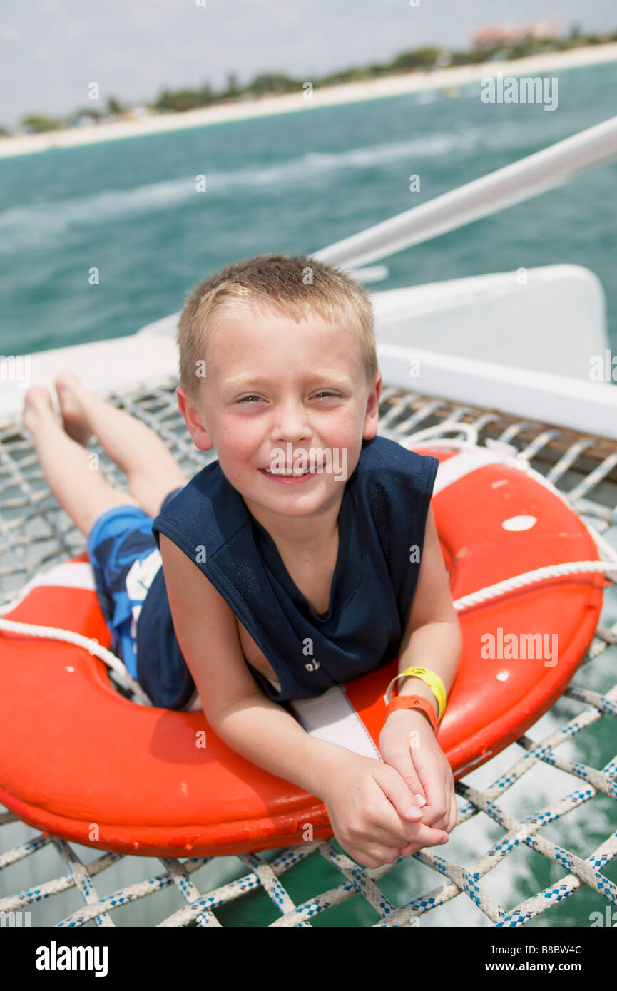 Young Boy Life Saver Catamaran Stock Photo - Alamy