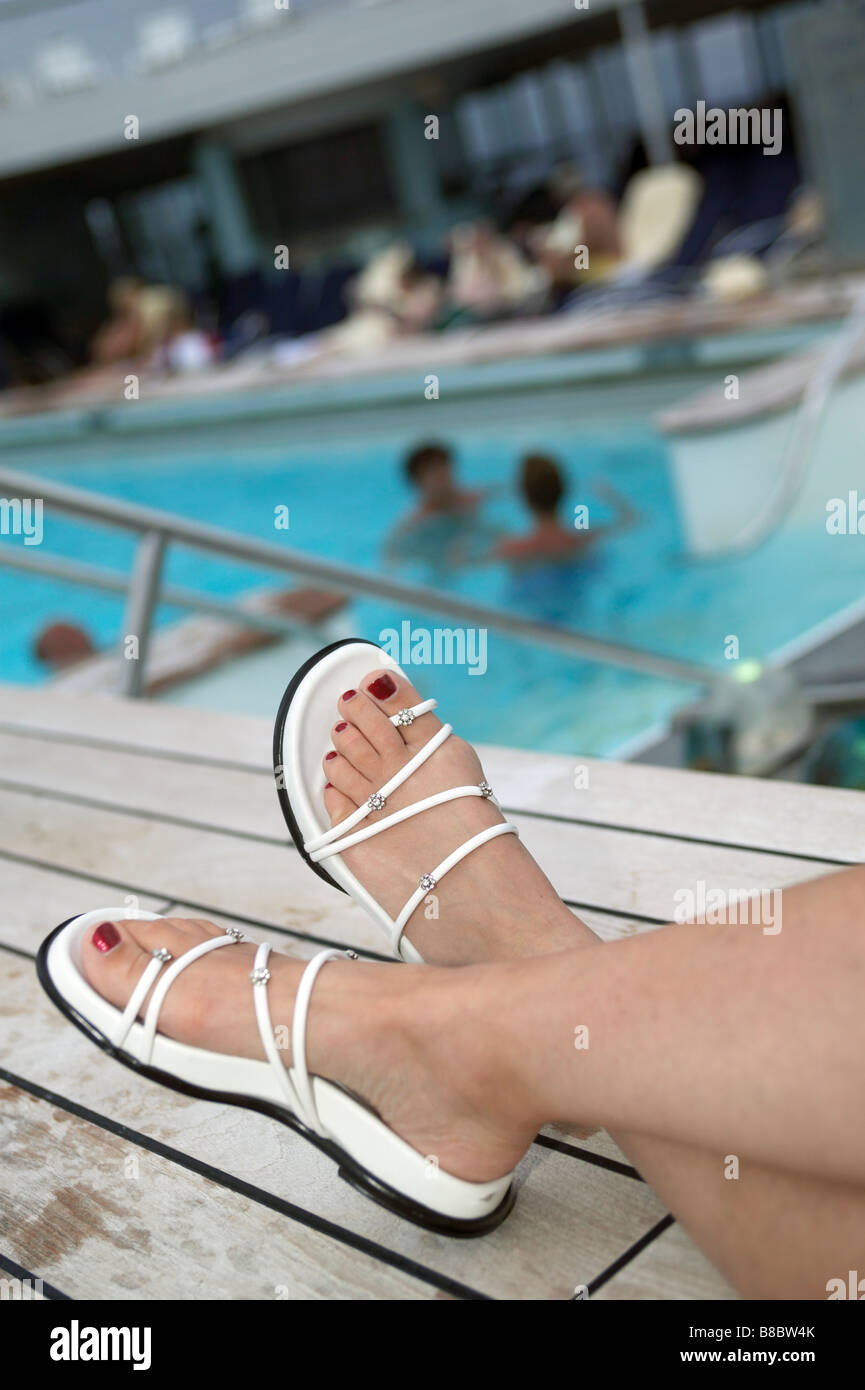 Woman's Feet Sandals by Pool Swimmers Stock Photo - Alamy