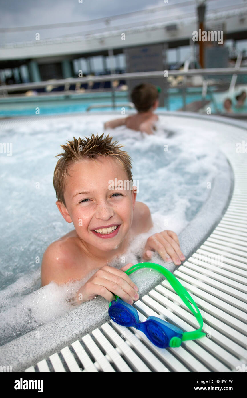 Boy Edge Hot Tub Cruise Ship Stock Photo - Alamy