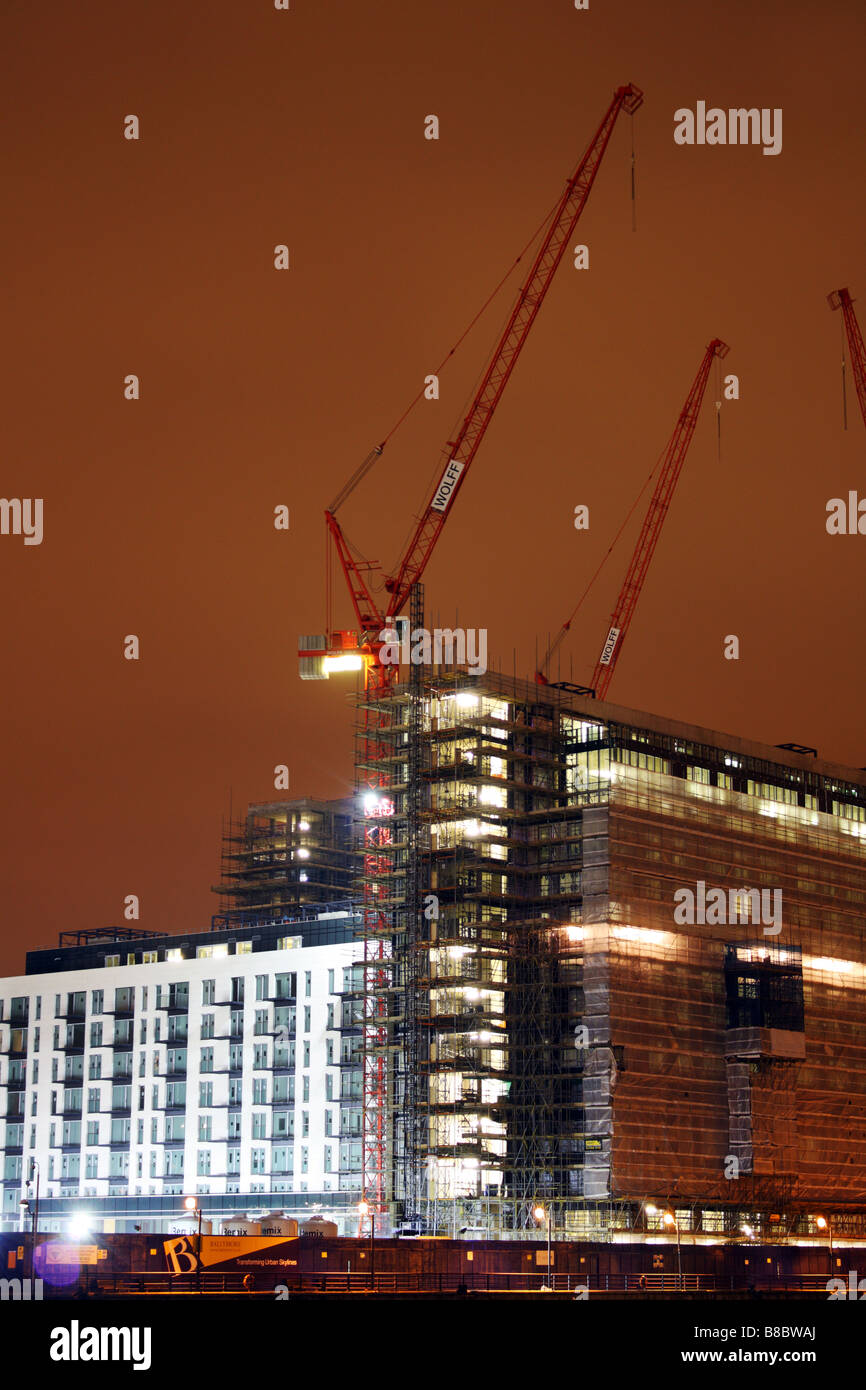 Generic construction picture of scaffolding and cranes Stock Photo - Alamy